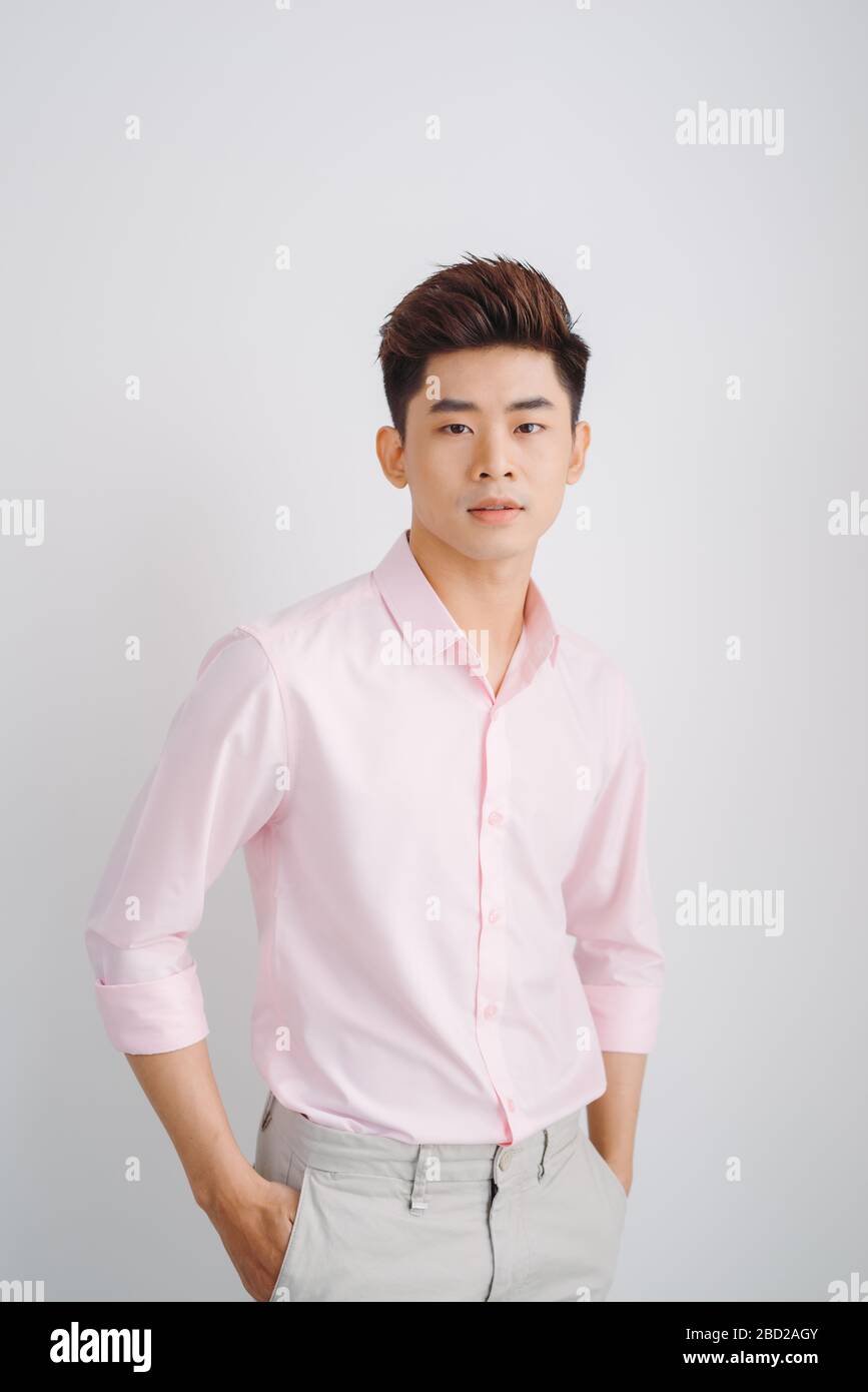 Portrait of good looking asian man over white background Stock Photo ...