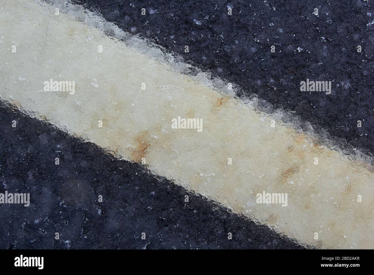 slush wet snow texture hidden under a layer of wet snow Stock Photo - Alamy