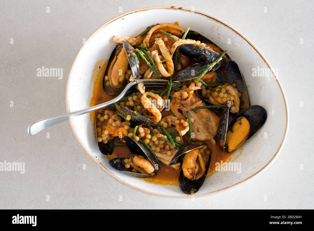 Fregola with seafood hi-res stock photography and images - Alamy