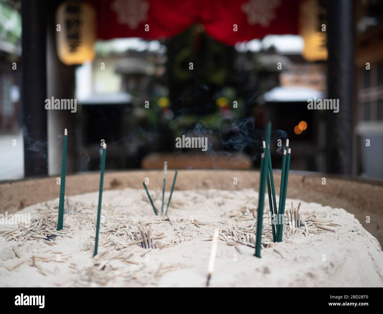 Hozen-ji, a buddhist temple in Dotonbori district, Osaka, Japan. The ...