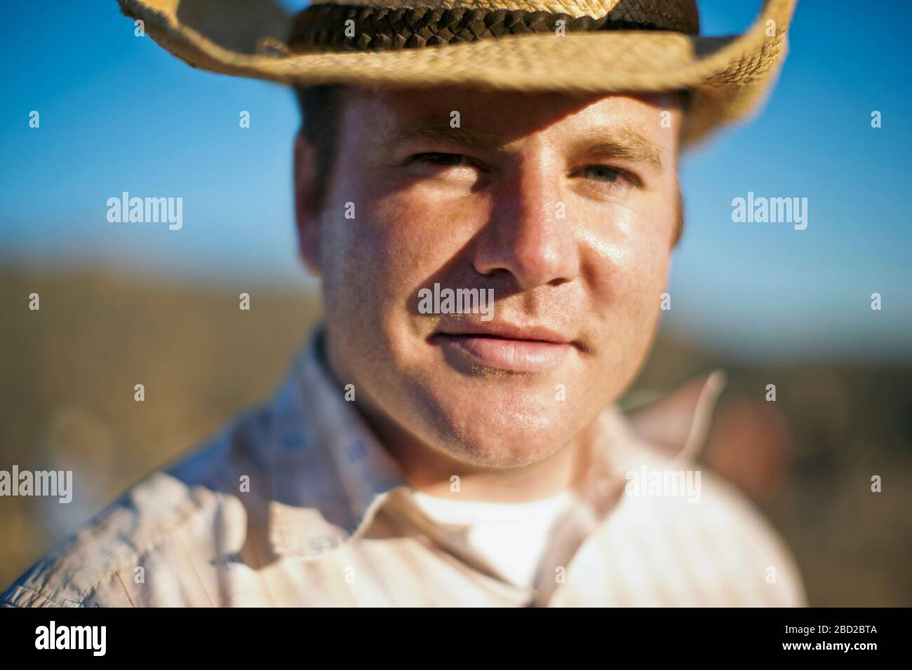 Portrait of a happy rancher Stock Photo - Alamy