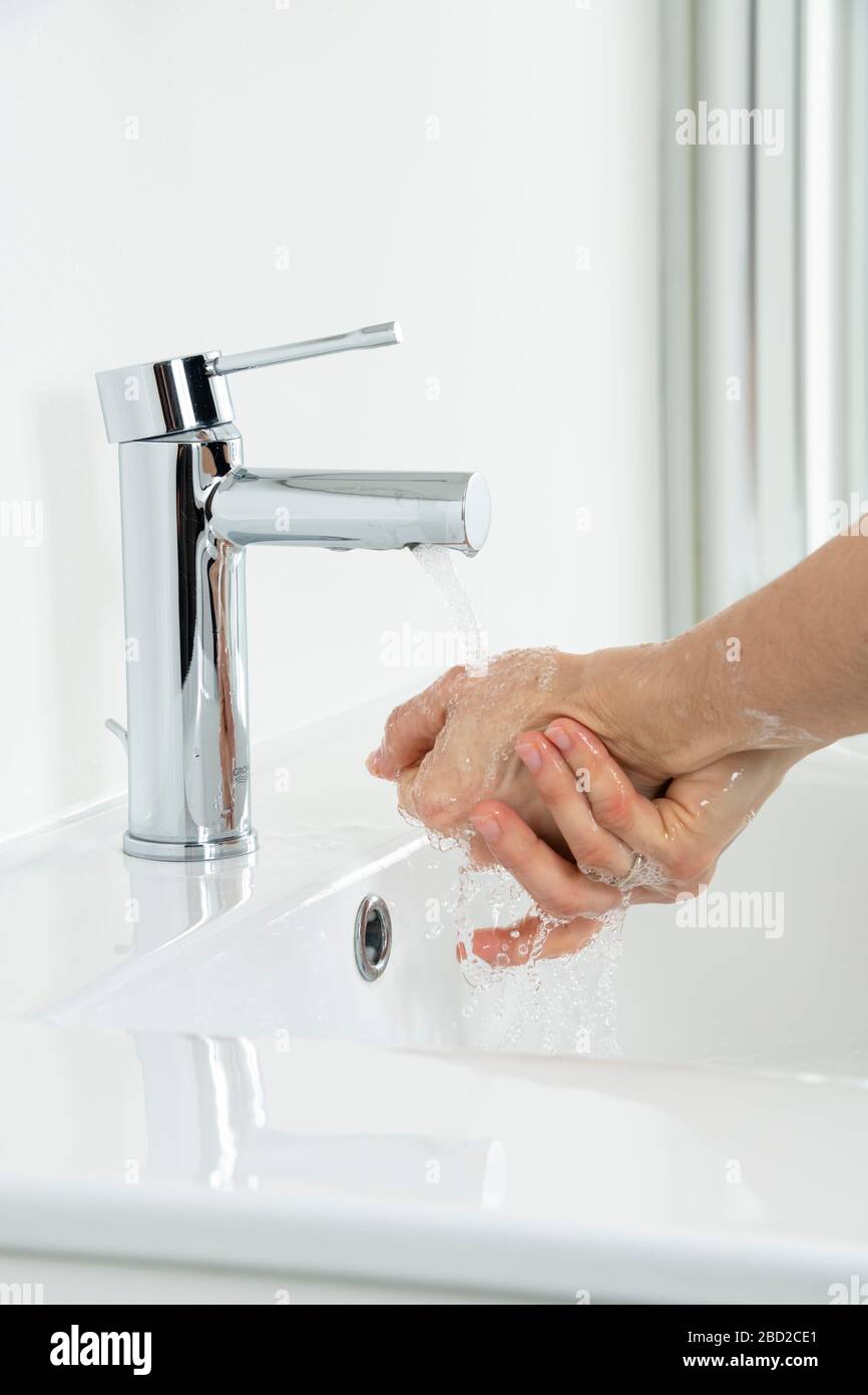 Washing hands with soap hi-res stock photography and images - Alamy