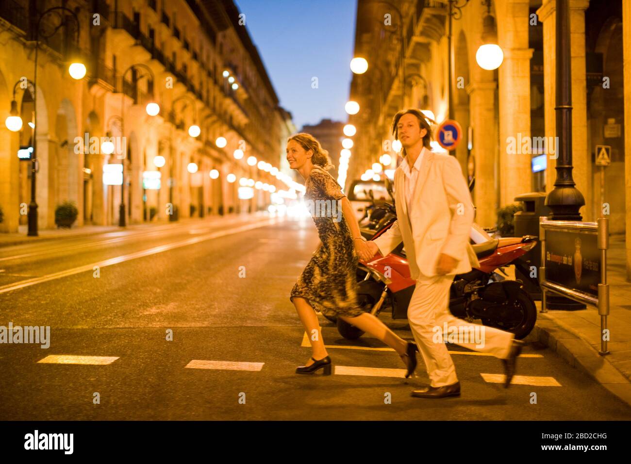 Man running across a street hi-res stock photography and images - Alamy