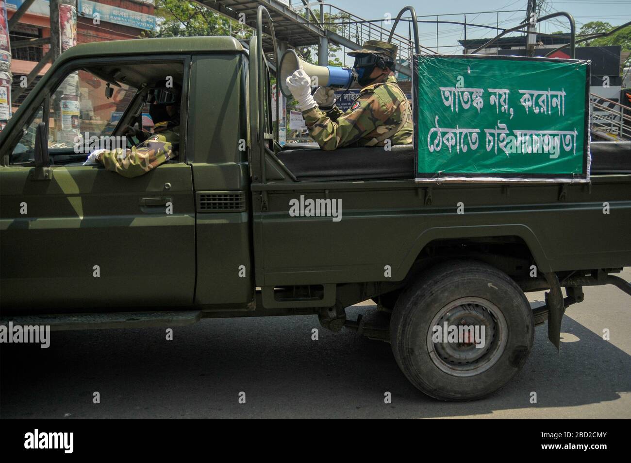 Bangladesh army personel advise people for raising awareness to ensure ...
