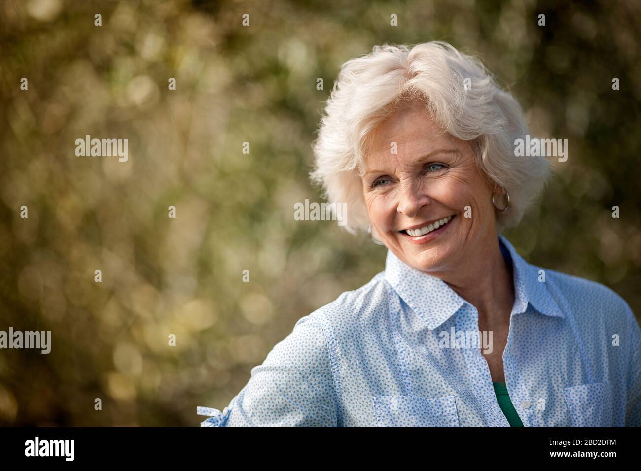 Old woman smiling Stock Photo - Alamy