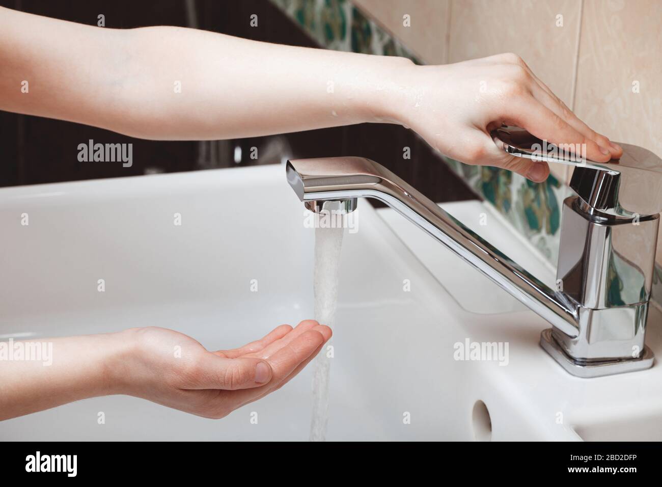 Child saving water hi-res stock photography and images - Alamy
