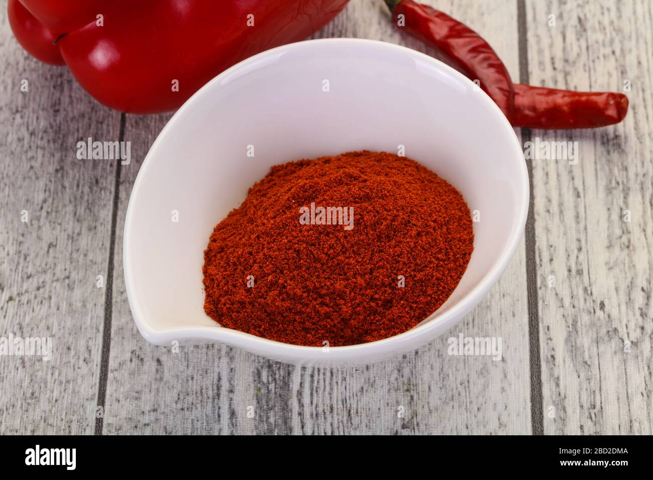 Sweet Paprika powder in the bowl Stock Photo - Alamy