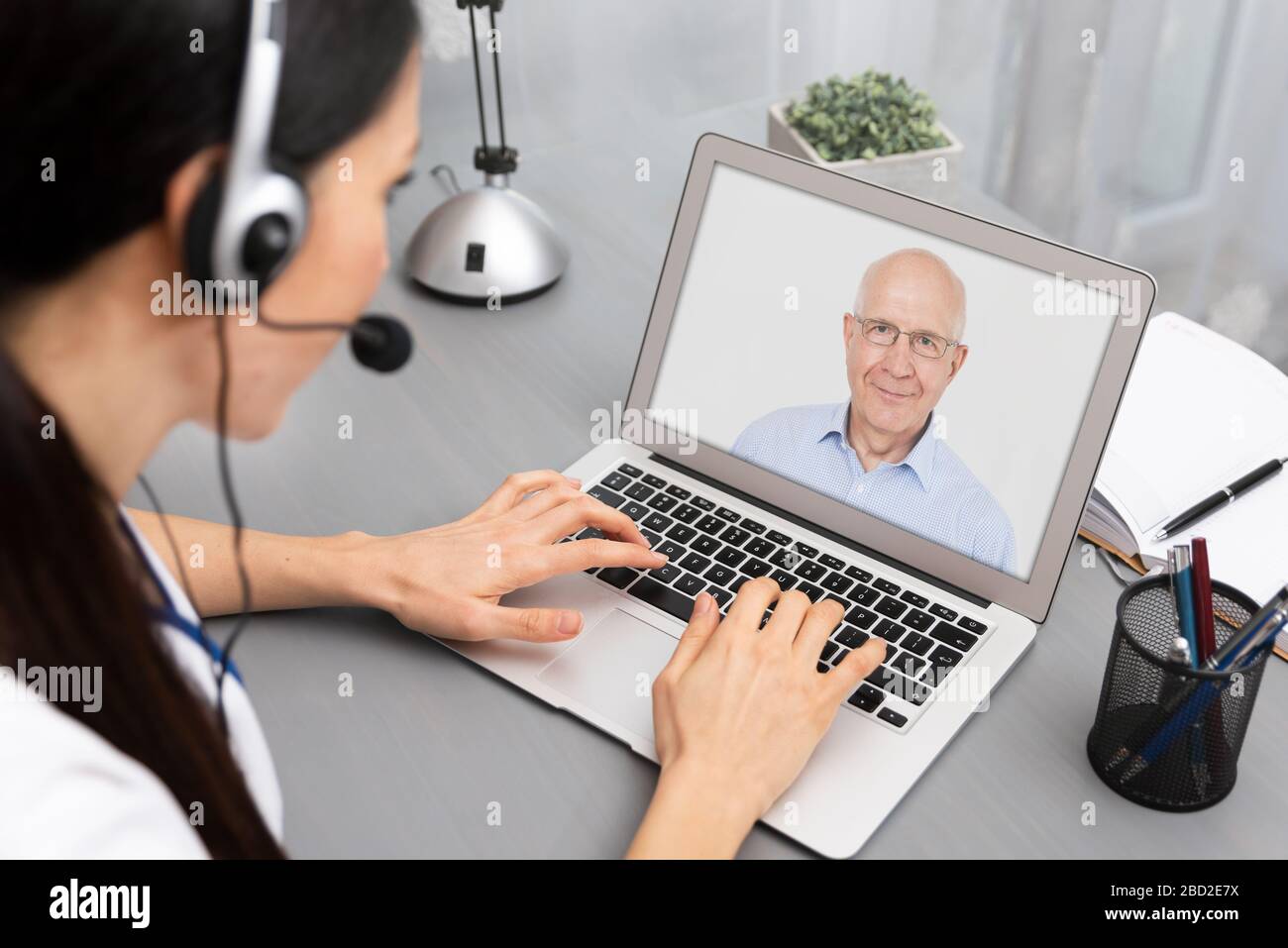 Doctor and senior man patient medical consultation, telehealth ...