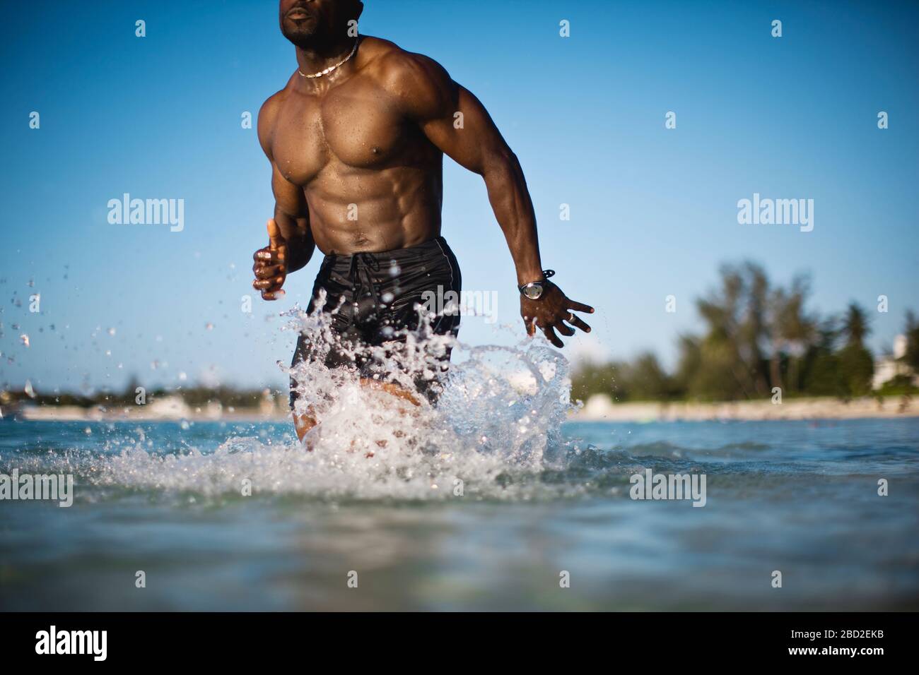 People exercising in seaside swimming hi-res stock photography and ...