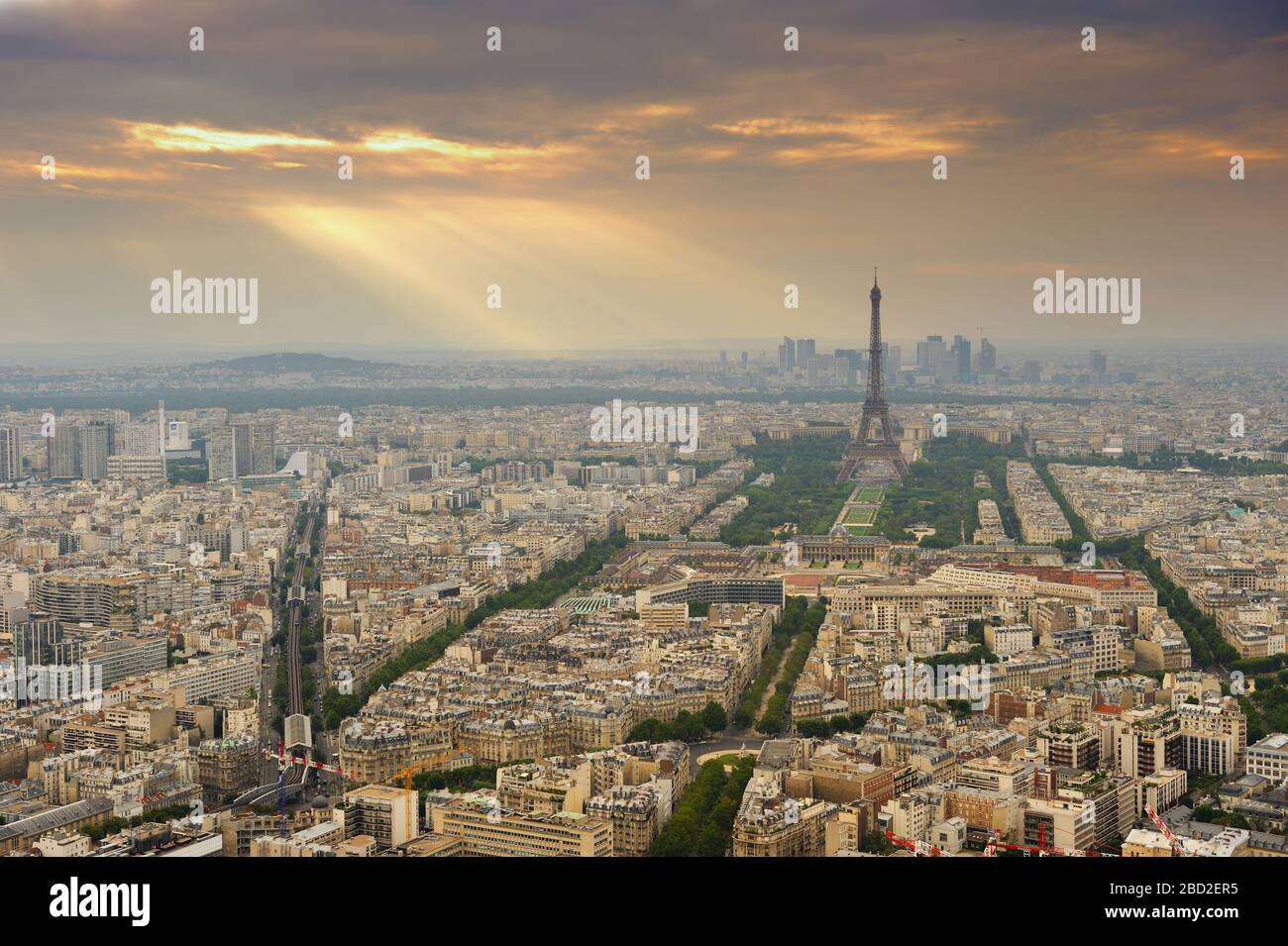 Aerial view of Paris, France. Eiffel tower in overcast sky with light ...
