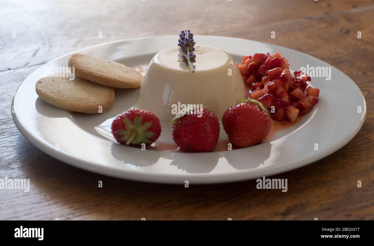 Panna cotta made from local cream, served with island-grown ...