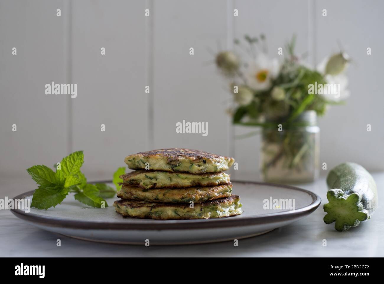 Courgette and mint patties Stock Photo - Alamy