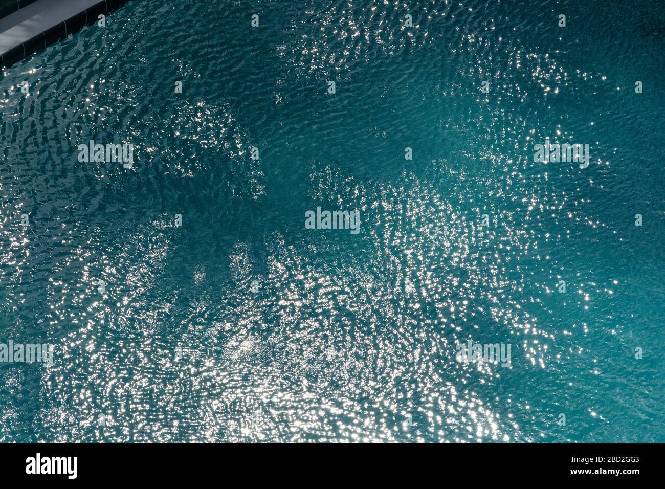 Blue pool water Stock Photo - Alamy