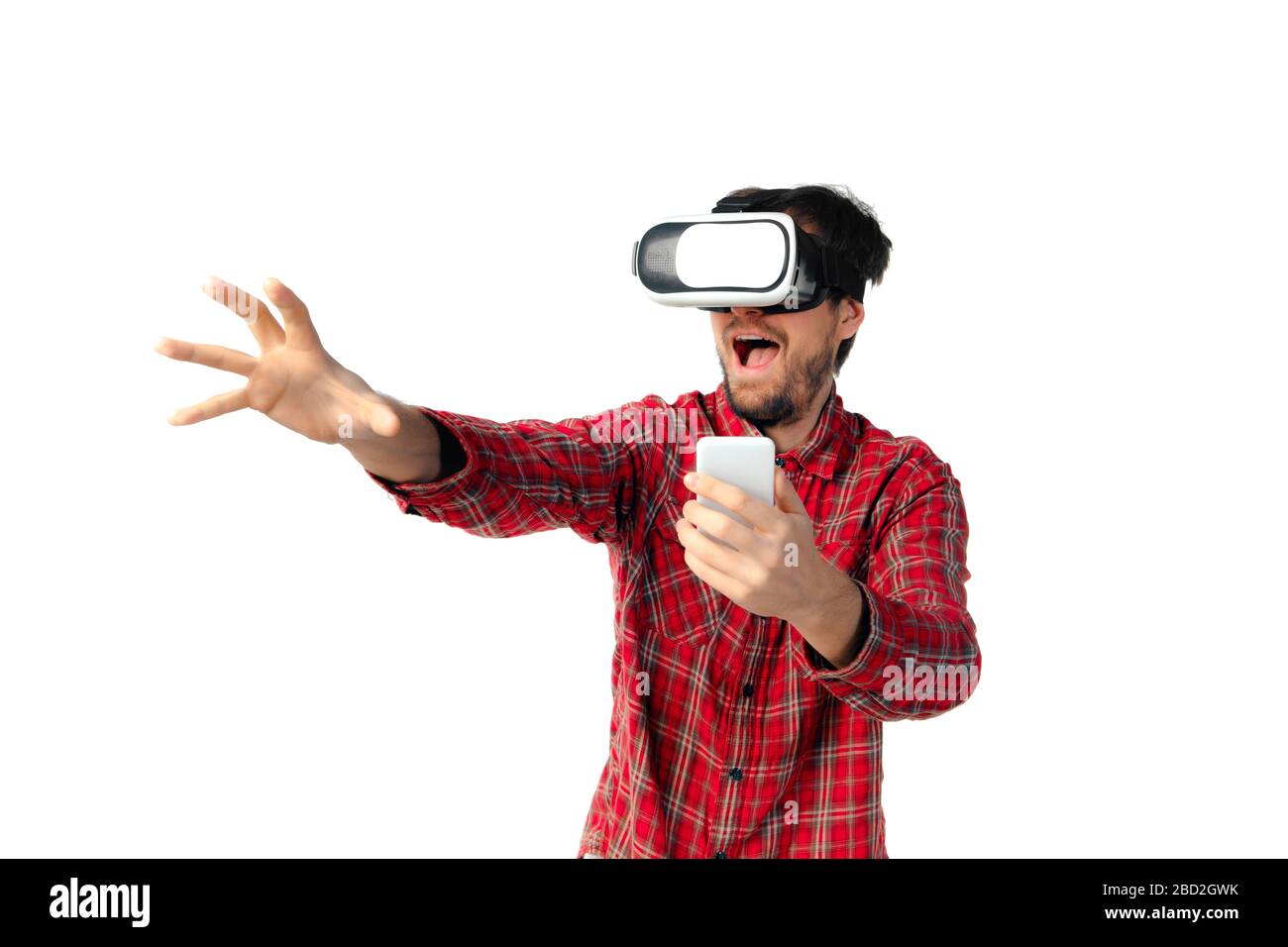Young caucasian man emotional playing, using virtual reality headset ...