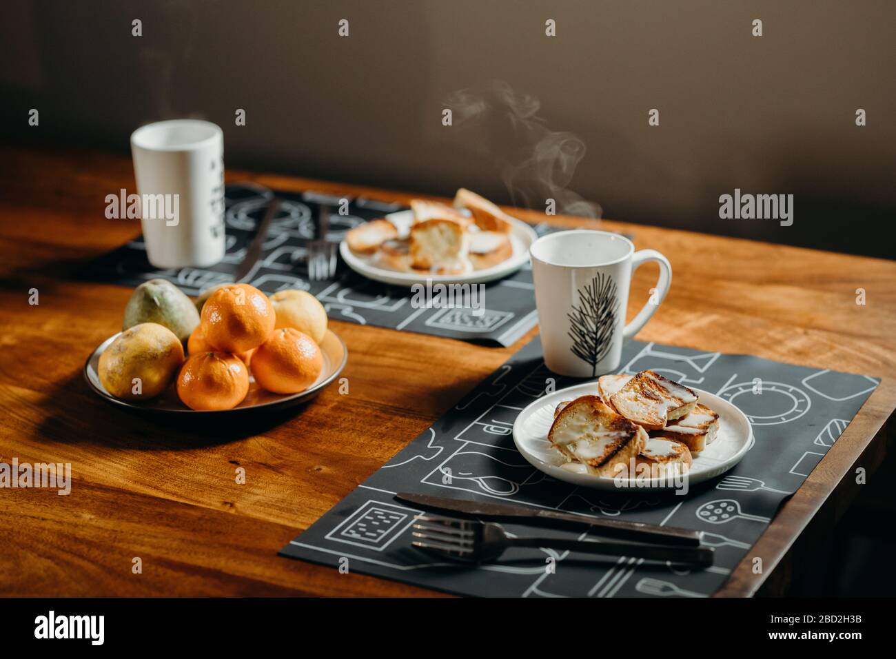 Breakfast setting for two people - Coffee, Tea, Breads and fruits Stock ...