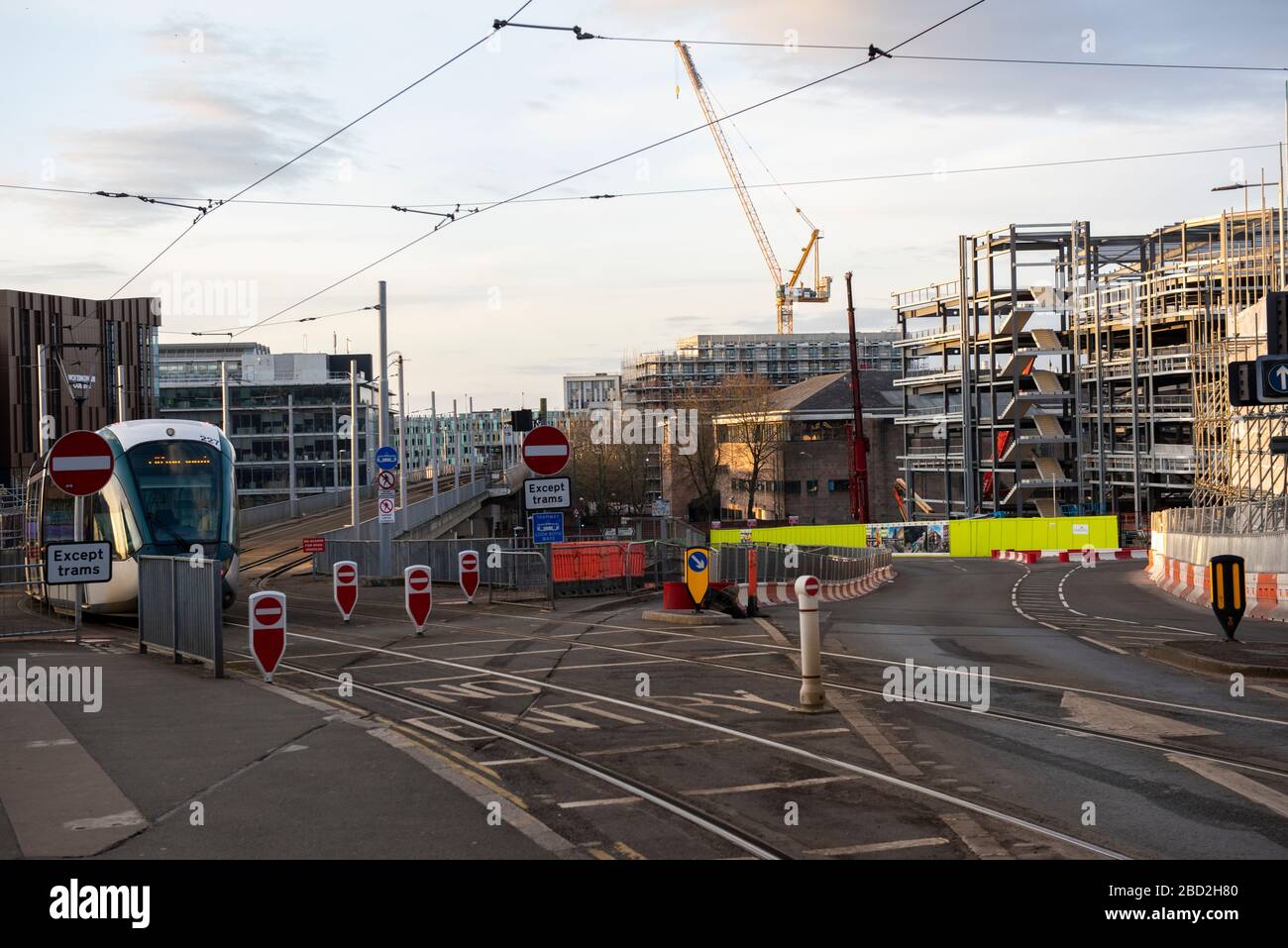 Tram on the South Side at sunrise in Nottingham City, captured during ...