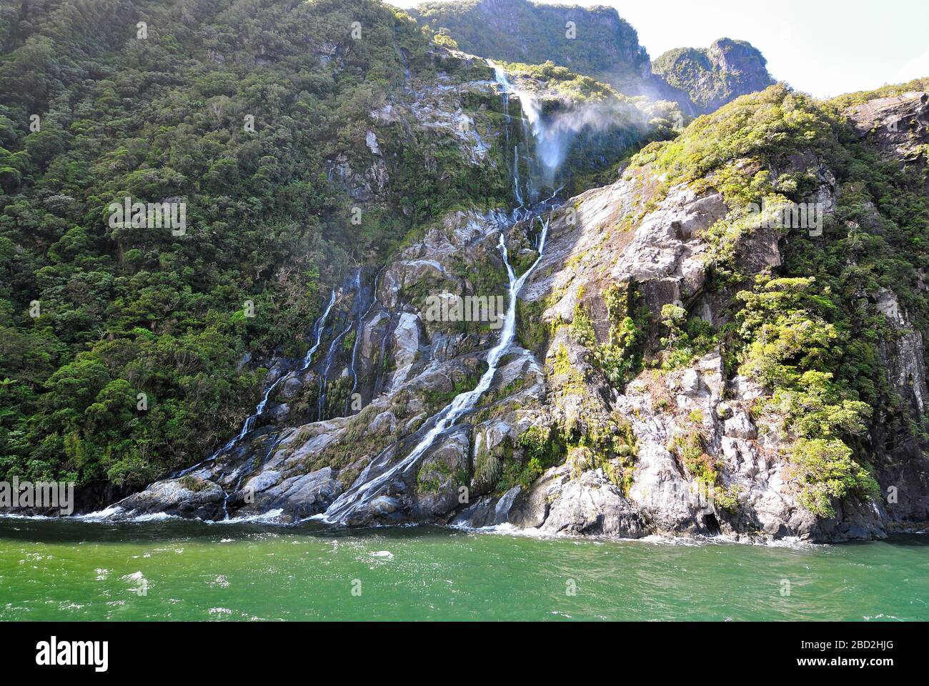 Waterfall at Milford Sound Stock Photo - Alamy