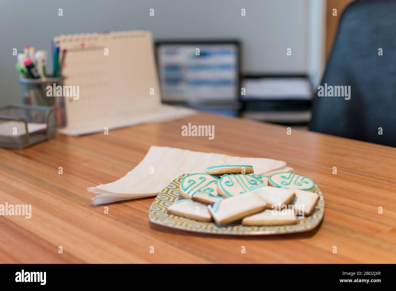 Stock photo of an office with a table with cookies, calendar and office ...