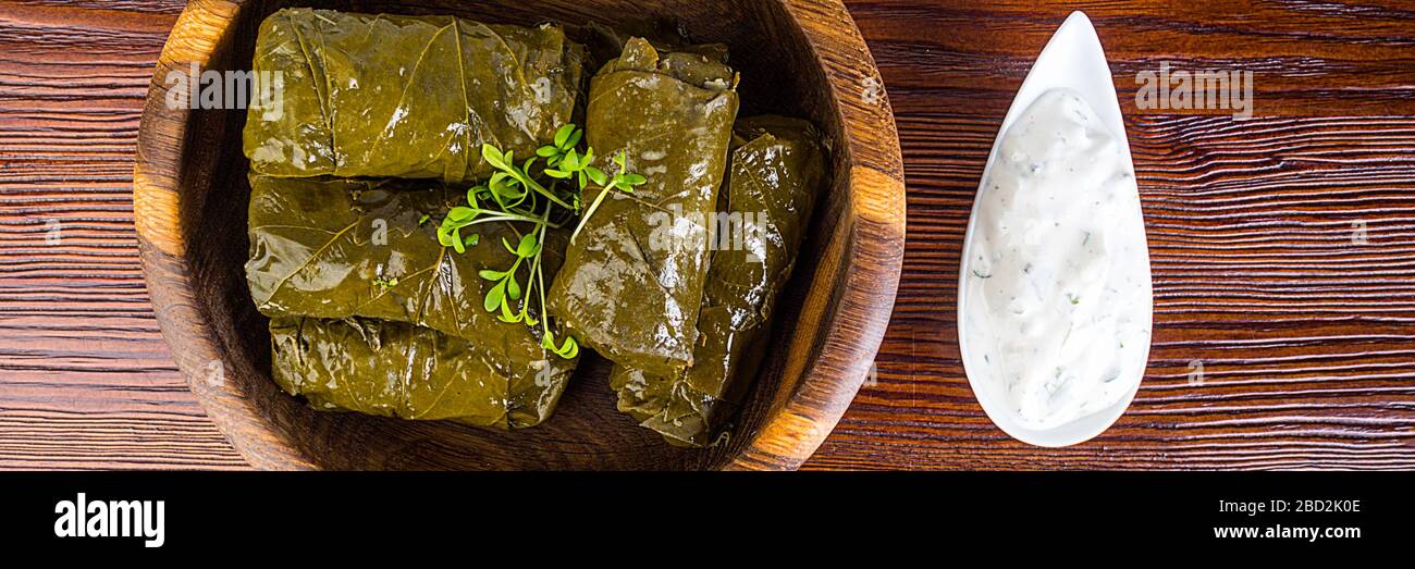 Dolma sarma or tolma stuffed grape leaves with rice, meat and white ...