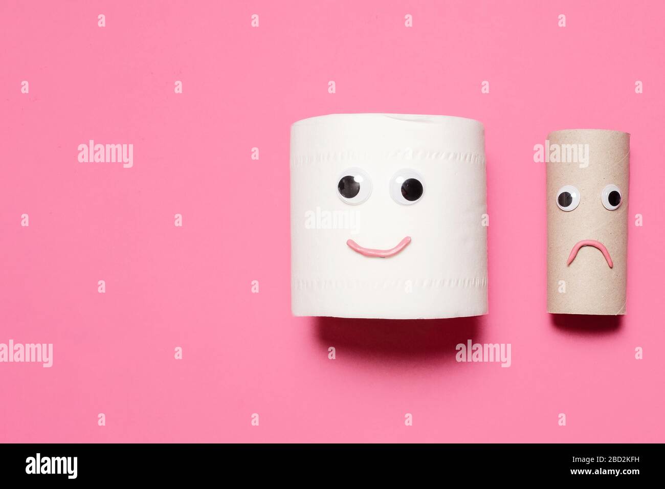 Happy and smiling full roll of toilet paper next to sad empty roll with ...