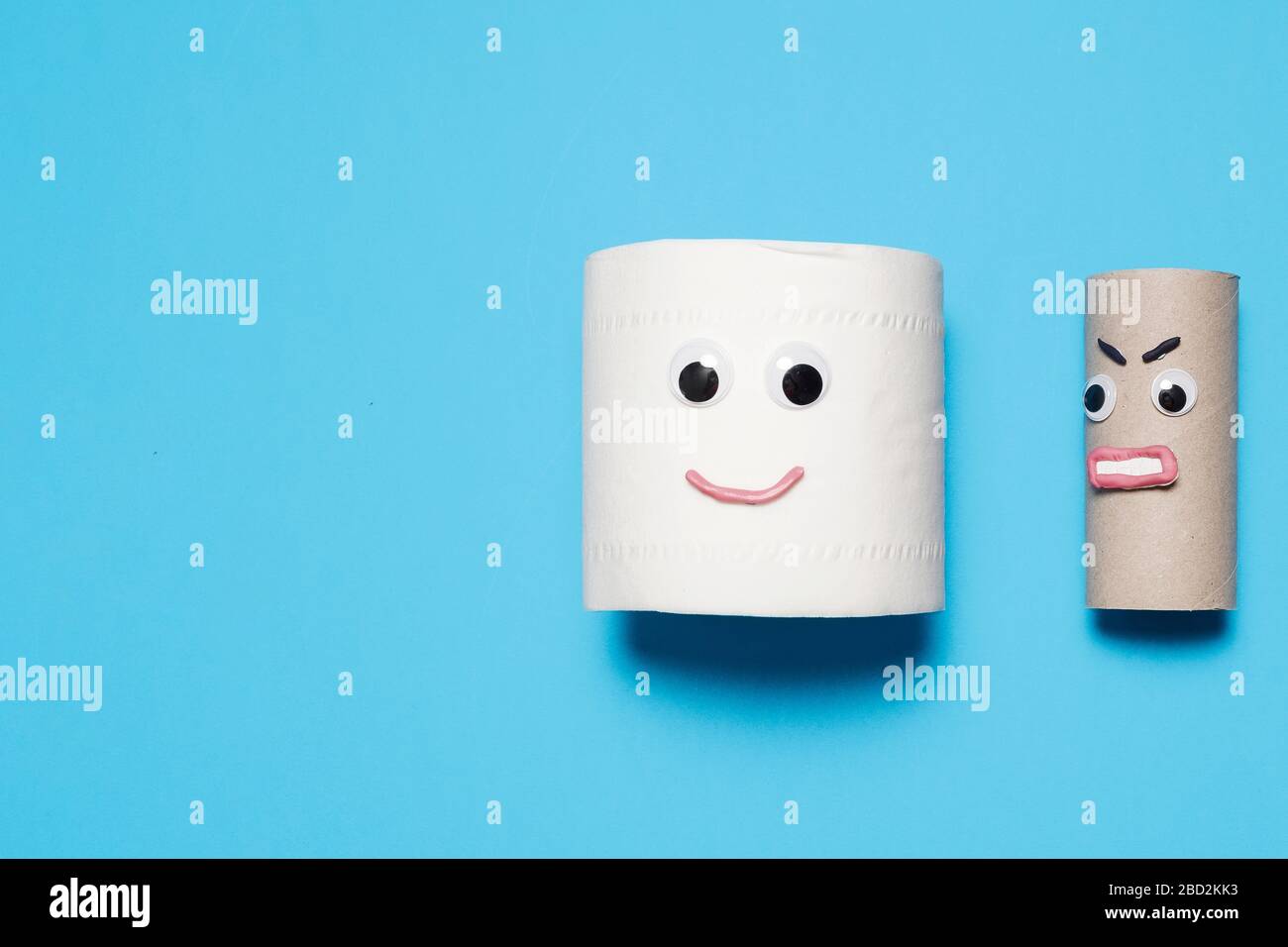 Happy smiling full roll of toilet paper next to angry empty roll with ...