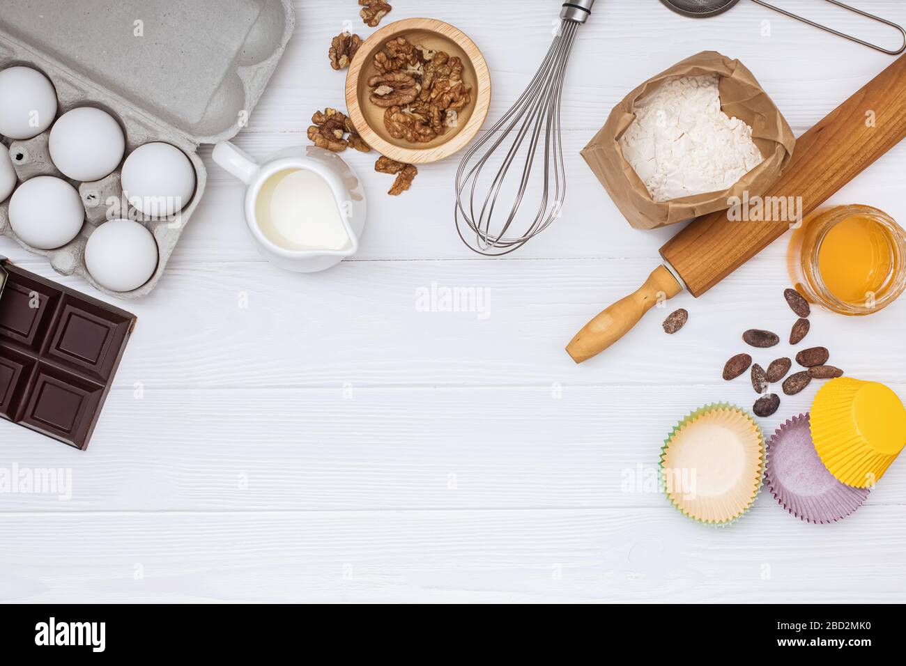 Ingredients and utensil for baking on white background Stock Photo - Alamy