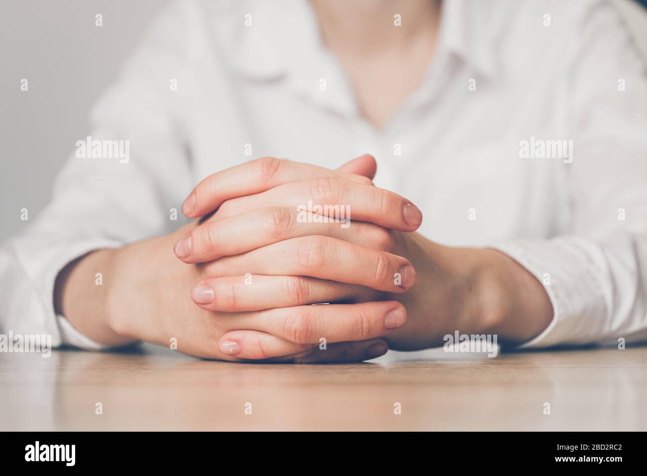 Concept of passing an employee job interview. Crossed hand in fingers ...