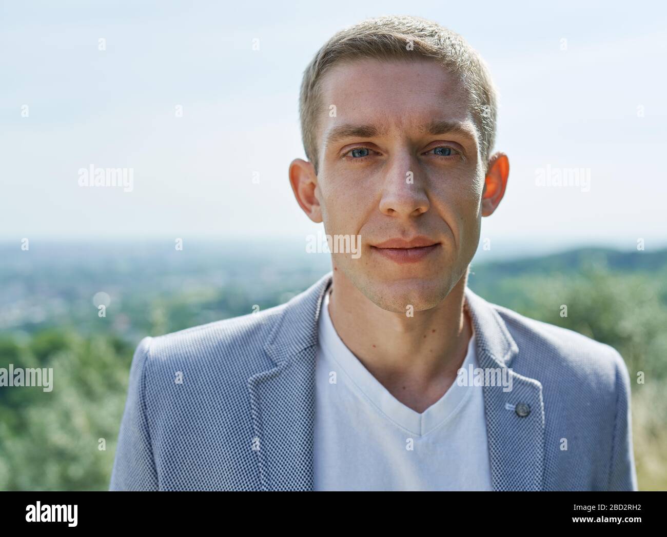 Portrait of serious young businessman Stock Photo - Alamy