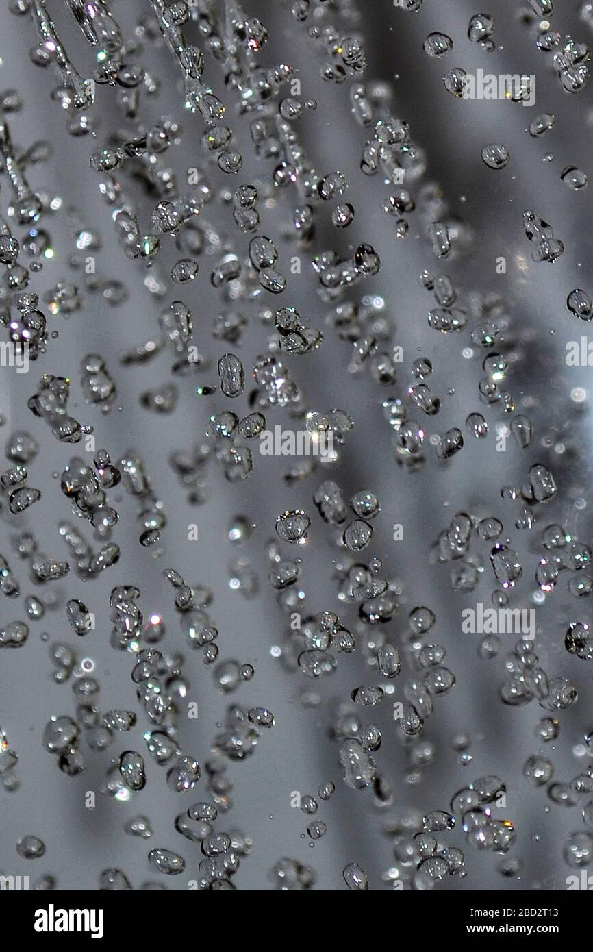 Sparkling of falling crystal clear water drops Stock Photo - Alamy