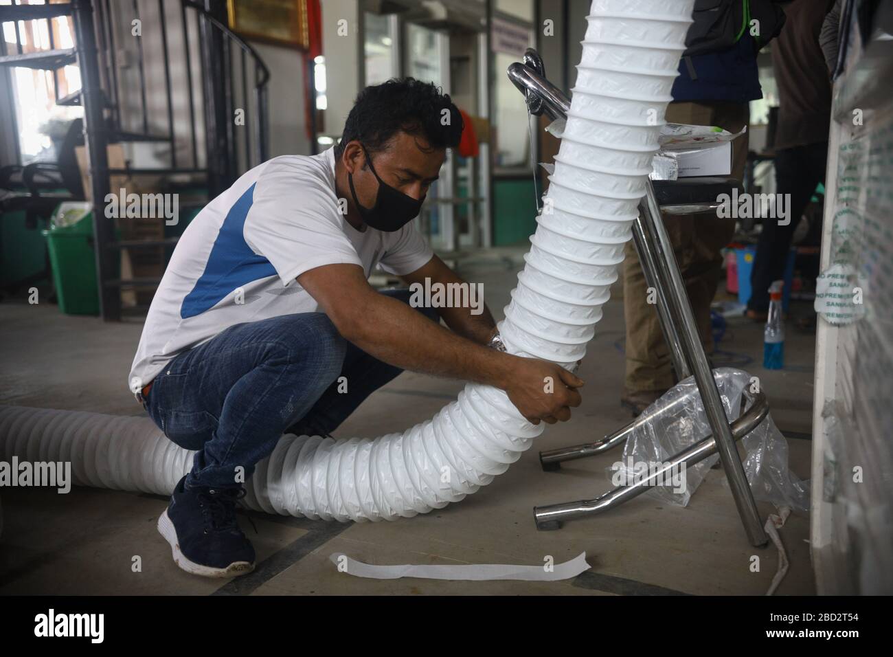 Kathmandu, Nepal. 06th Apr, 2020. A man check contamination check booth ...