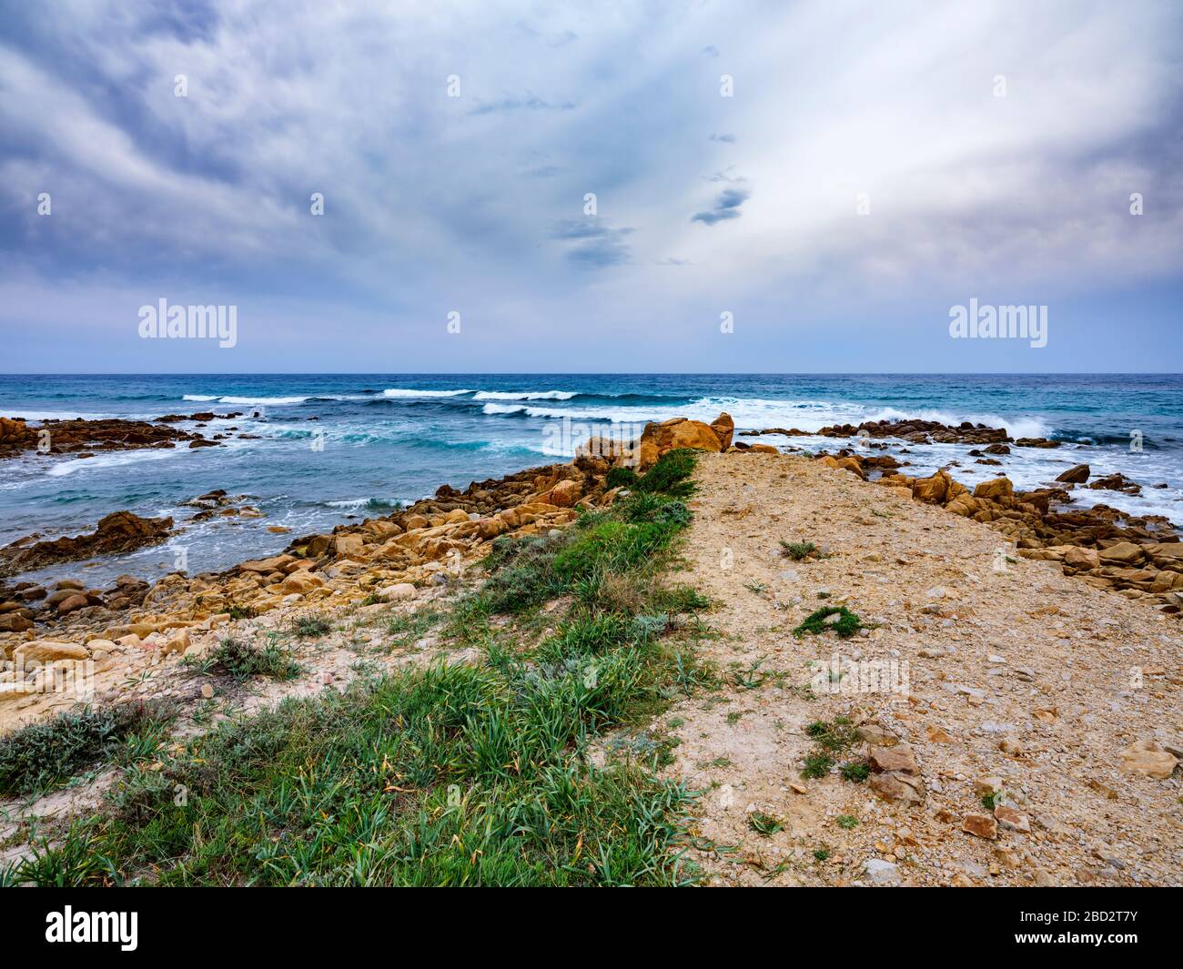Spring at Cala Liberotto with the clear sea and the wild nature of the ...