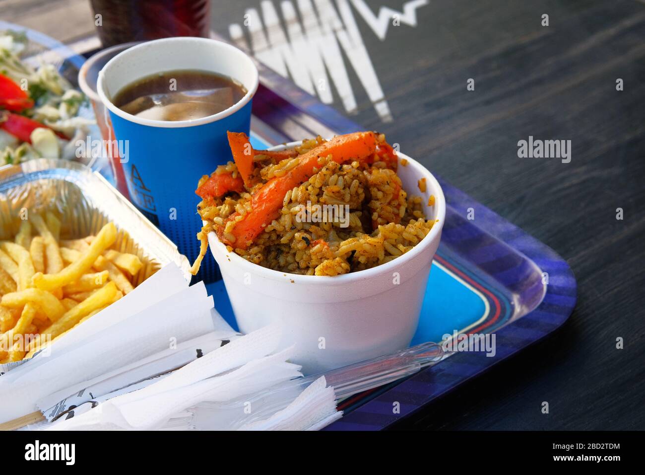 Tray with street food. Plov, traditional food of middle Asia. Street ...