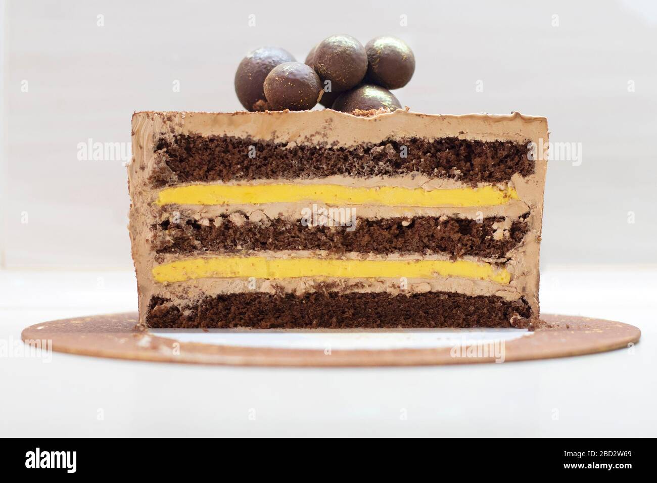 chocolate cake cut in half. A close up Stock Photo - Alamy