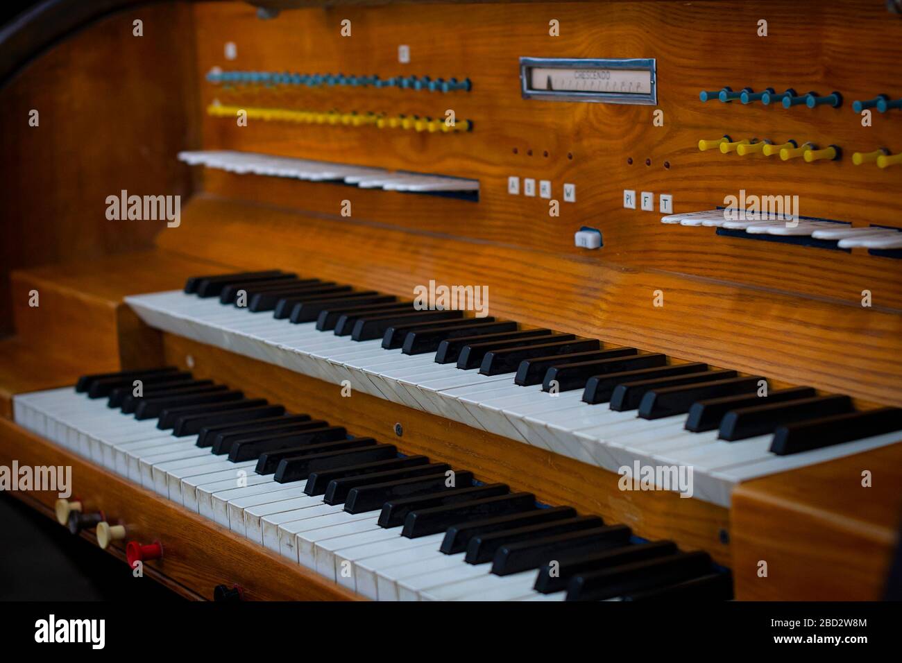 Pipe organ keyboards - console close up Stock Photo - Alamy
