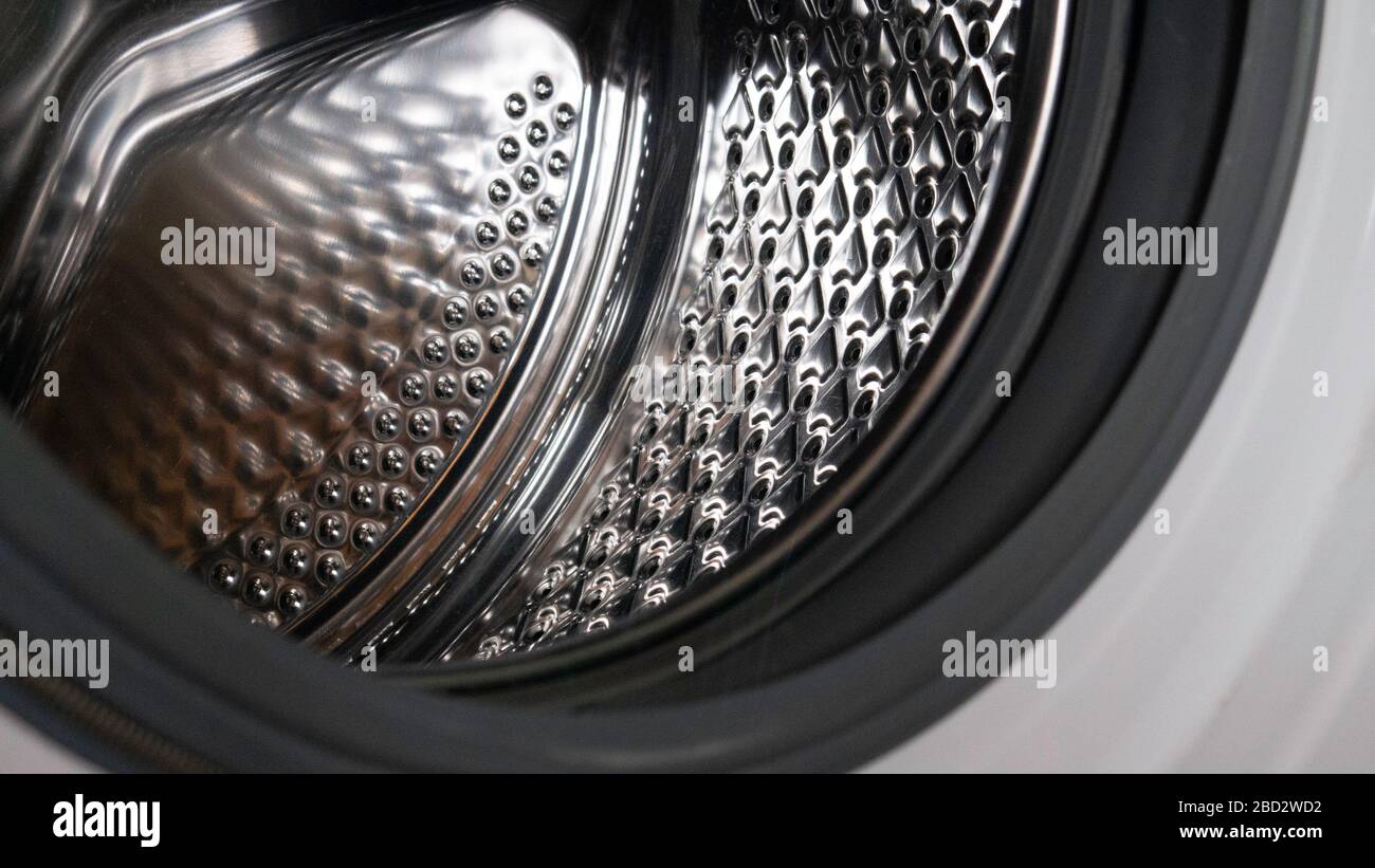 Open washing machine drum close up Stock Photo - Alamy