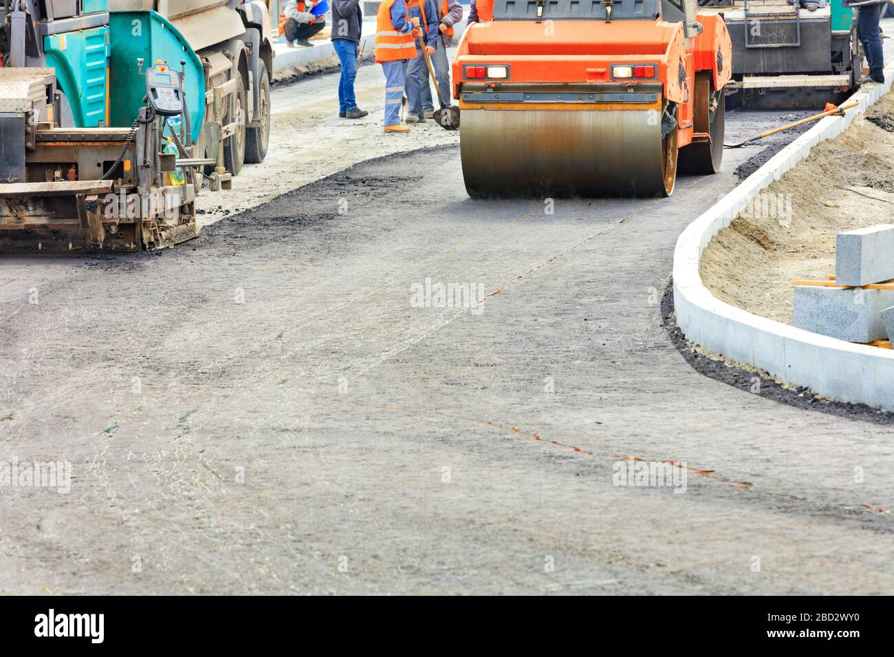 Heavy road equipment, such as pavers and a road vibratory roller, are ...