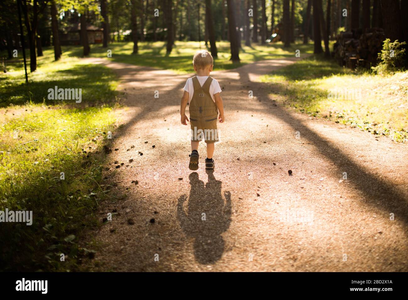 Woman with small backpack walks hi-res stock photography and images - Alamy