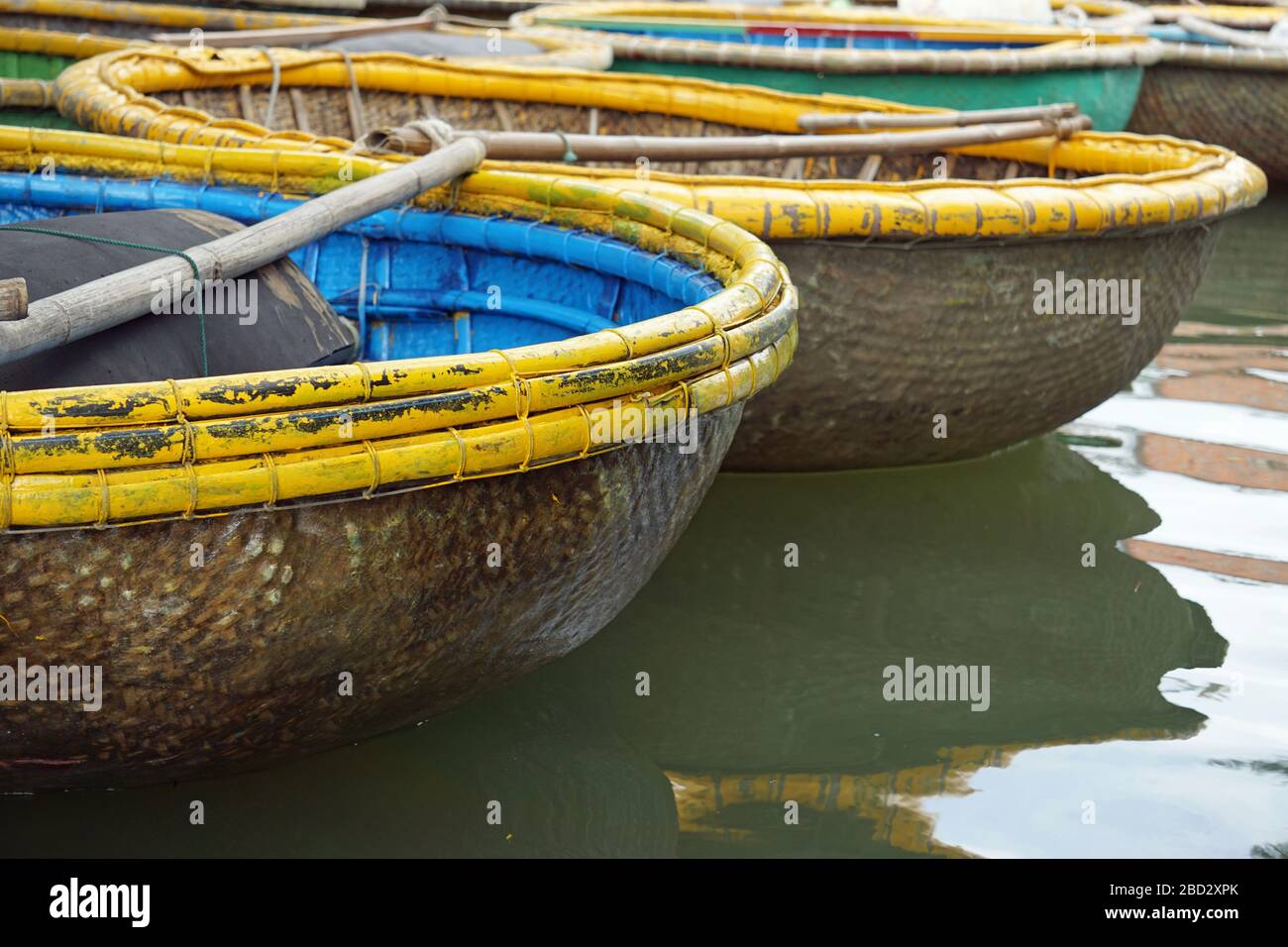 traditional round fisher basket boat from vietnam Stock Photo - Alamy