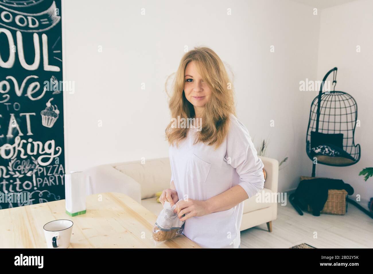 Woman cook in white hi-res stock photography and images - Alamy