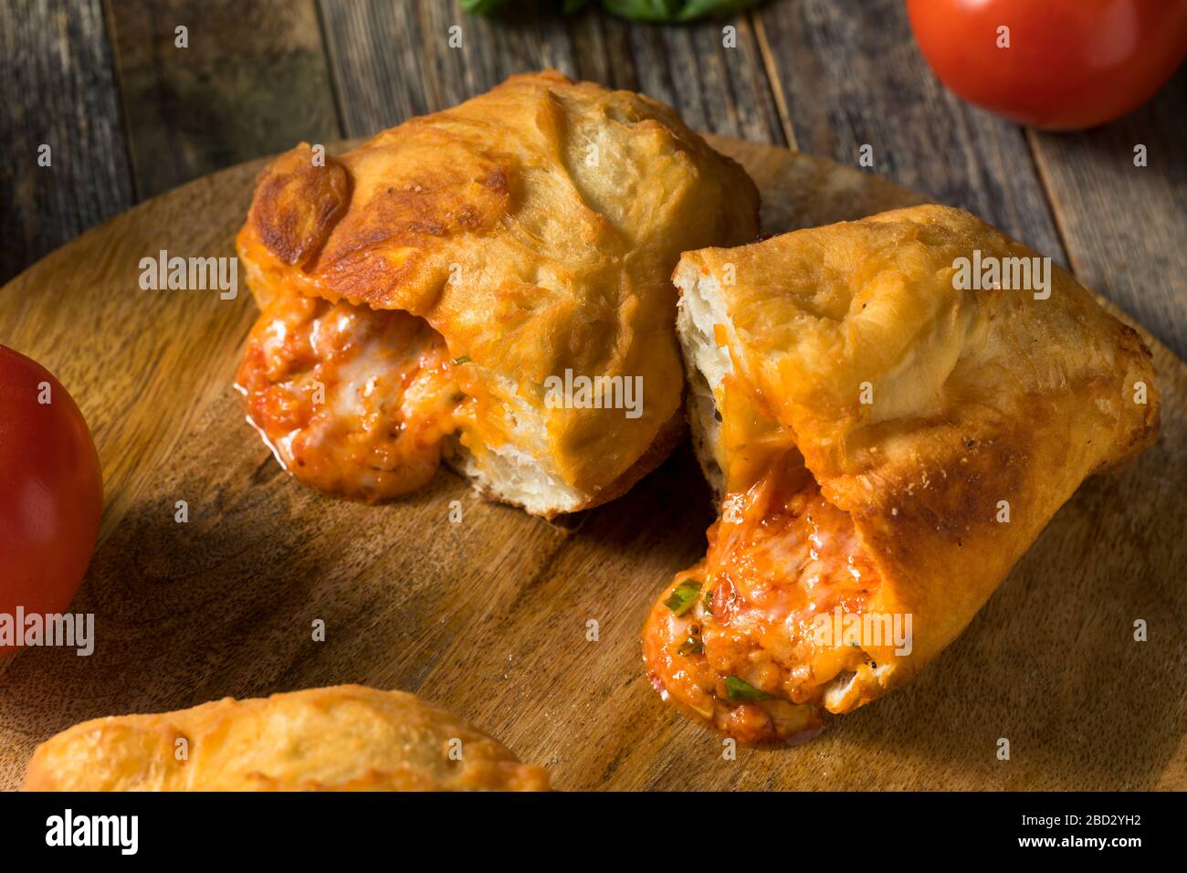 Homemade Italian Cheesy Panzerotti Calzone with Basil and Sauce Stock ...