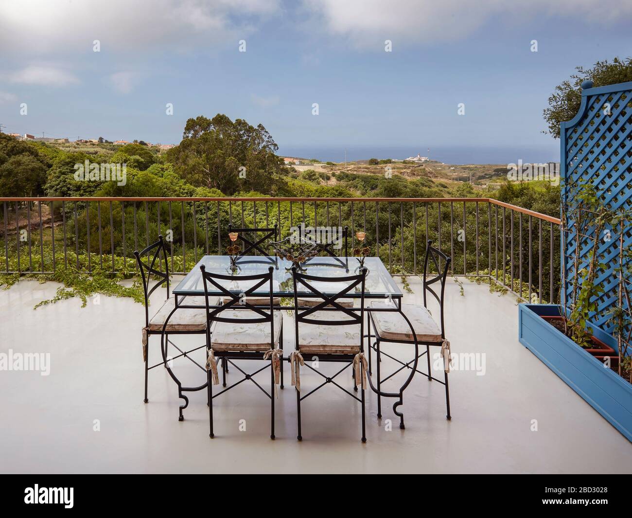 House exterior, terrace with two chairs and sea view Stock Photo - Alamy