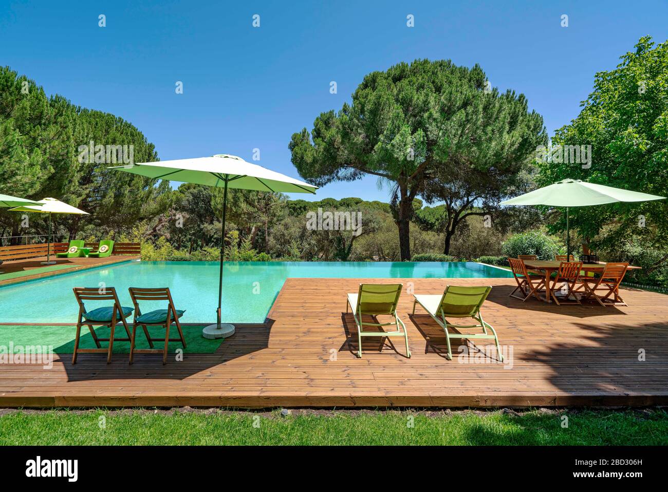 Home exterior, pool. tree green Stock Photo - Alamy