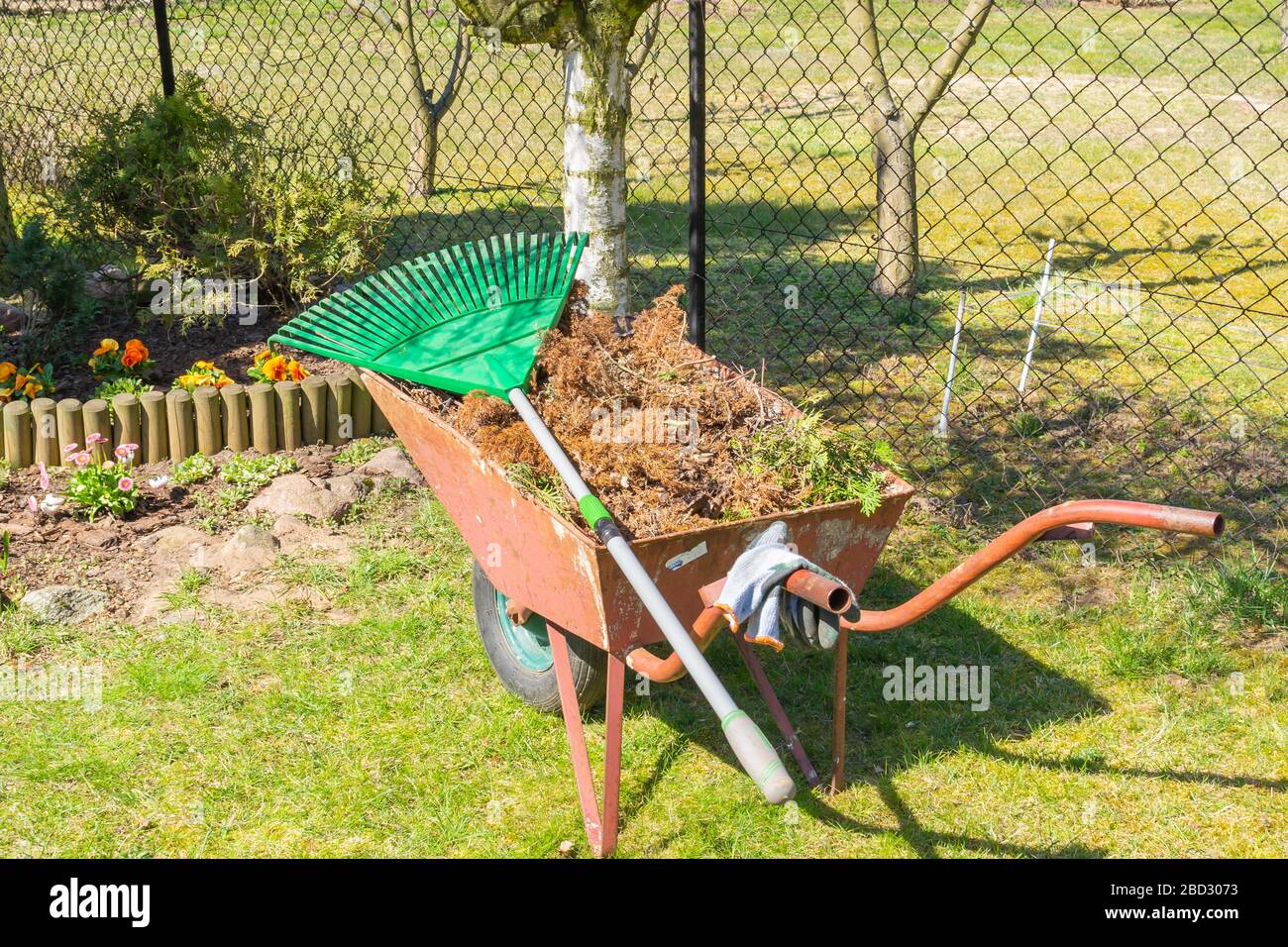 Spring cleaning in the garden Stock Photo - Alamy