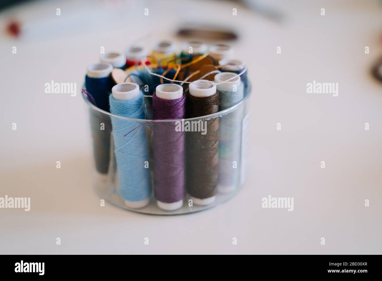 closeup photo of multicolored ribbons to sew Stock Photo - Alamy