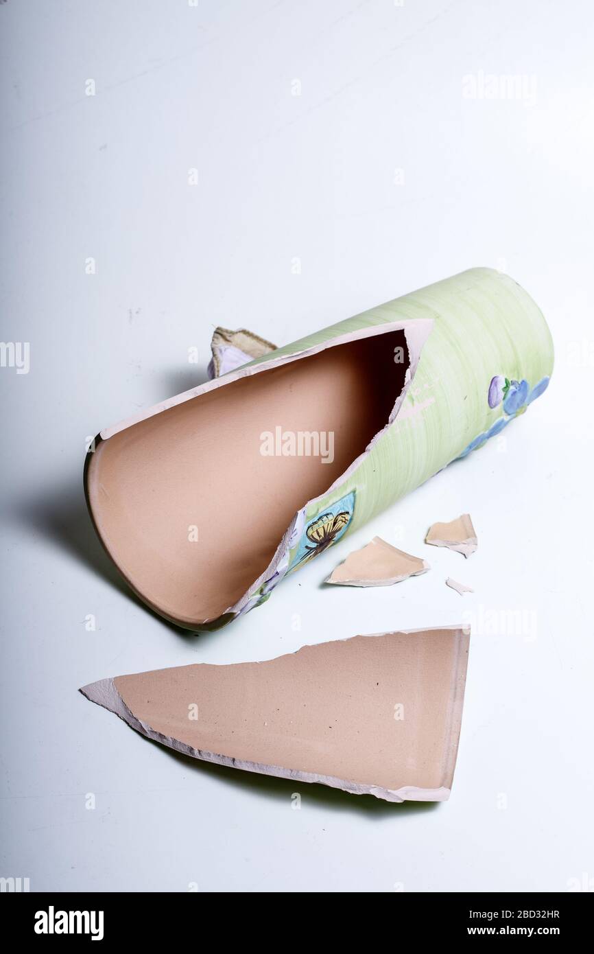 Broken Porcelain Vase Lying on White Background Stock Photo - Alamy