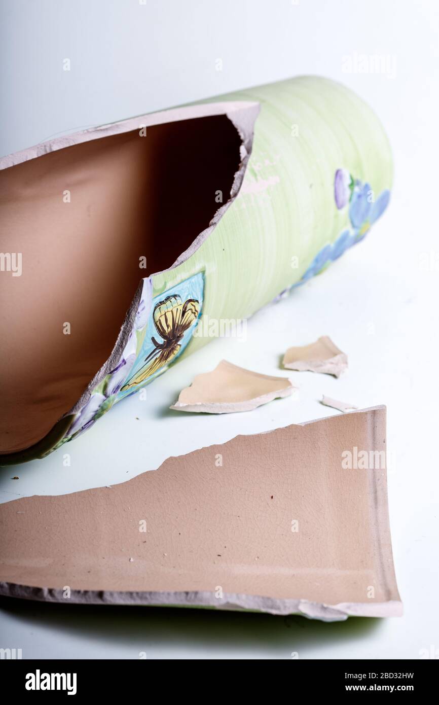 Broken Porcelain Vase Lying on White Background Stock Photo - Alamy