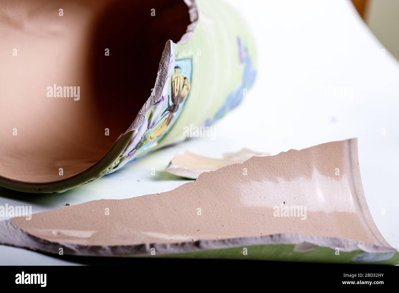 Broken Porcelain Vase Lying on White Background Stock Photo - Alamy
