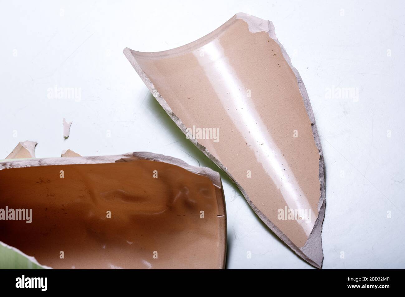Broken Porcelain Vase Lying on White Background Stock Photo - Alamy
