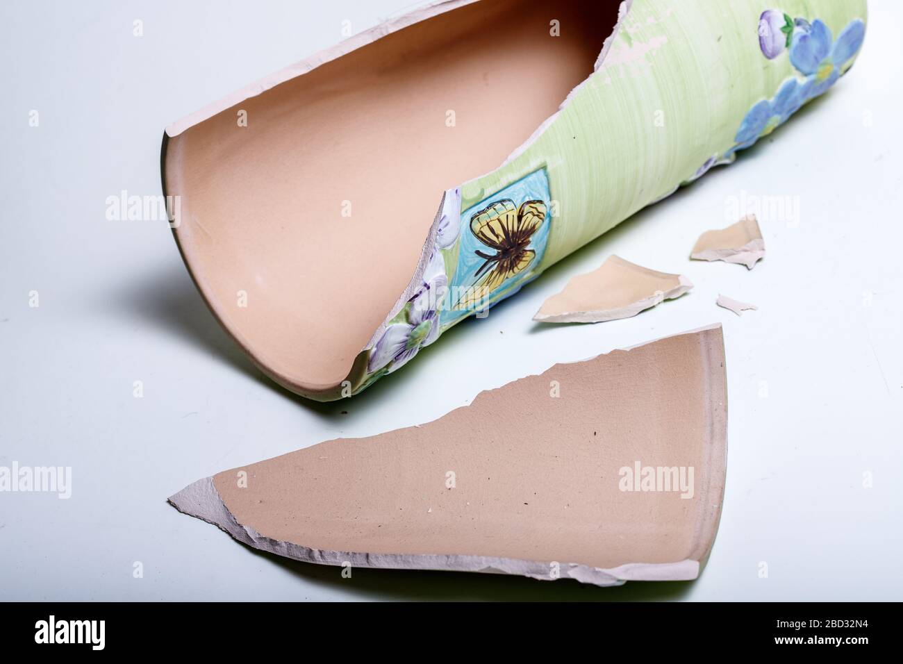 Broken Porcelain Vase Lying on White Background Stock Photo - Alamy