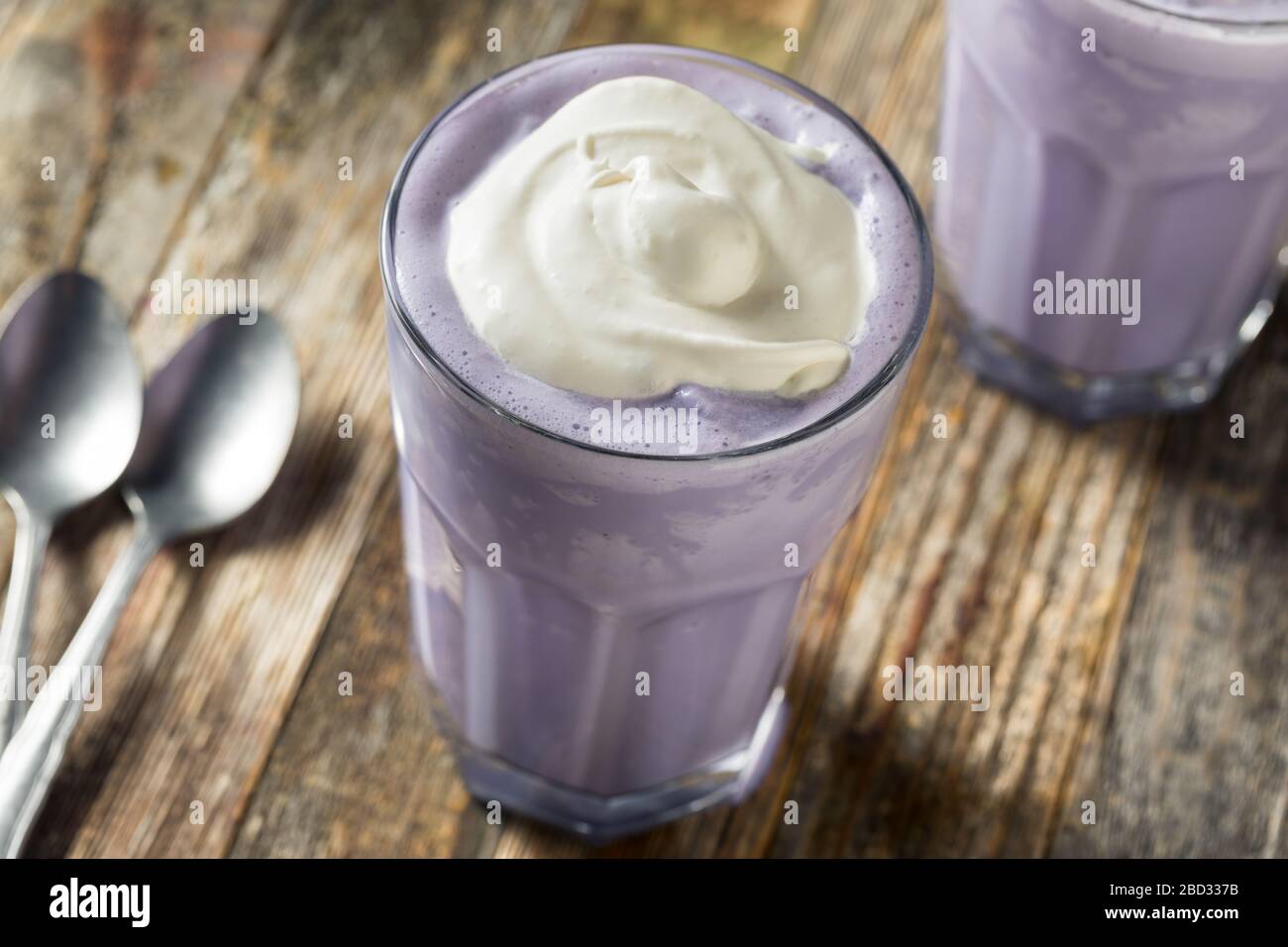 Homemade Japanese Purple Ube Milkshake with Whipped Cream Stock Photo ...